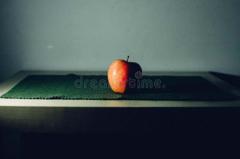 Apple stock photo. Image of darkroom, apple, lights, black - 67537084