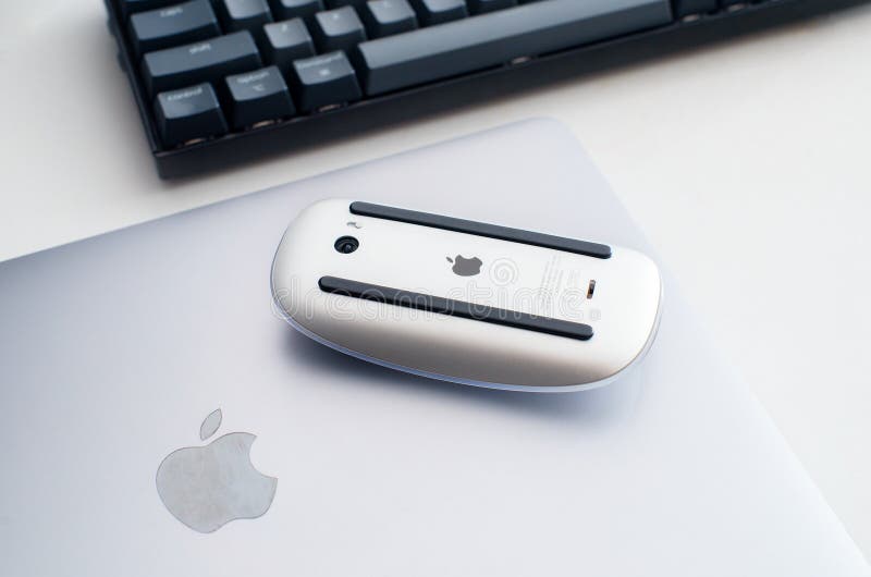 Apple Magic Mouse Showing Its Underneath Details on Top of Apple ...
