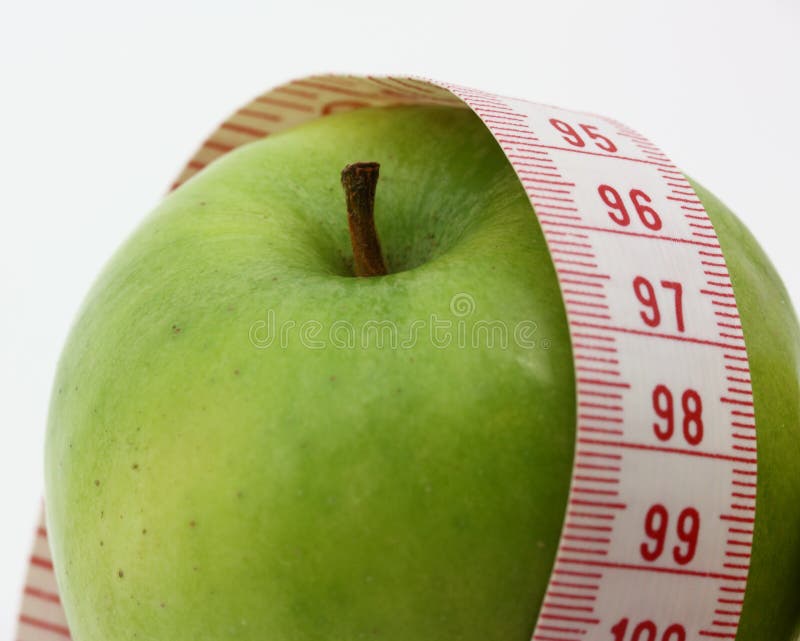 Apple and measurement tape stock image. Image of health - 7731435