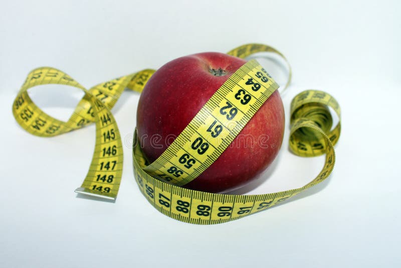 Apple with measuring tape stock photo. Image of isolated - 41757218