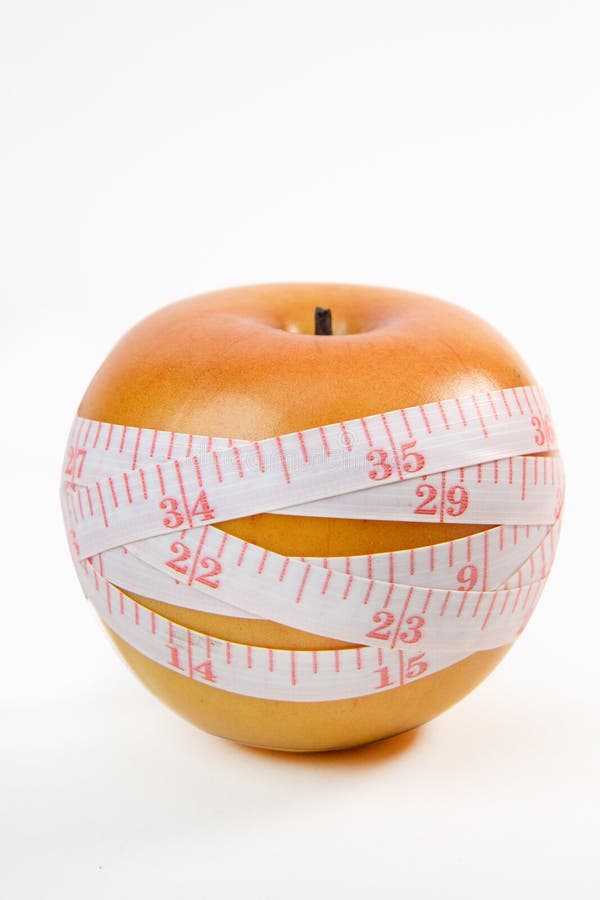 Apple & Measuring Tape on White Background Stock Photo - Image of black ...