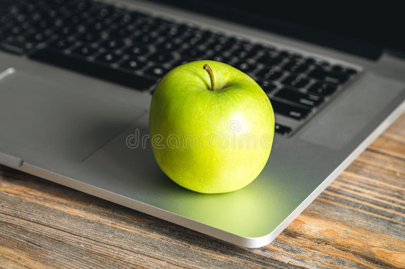 Apple Near Laptop at Workplace, Healthy Snack. Stock Image - Image of ...