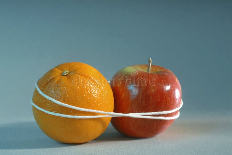 Apple and Orange stock photo. Image of string, apples - 5547596