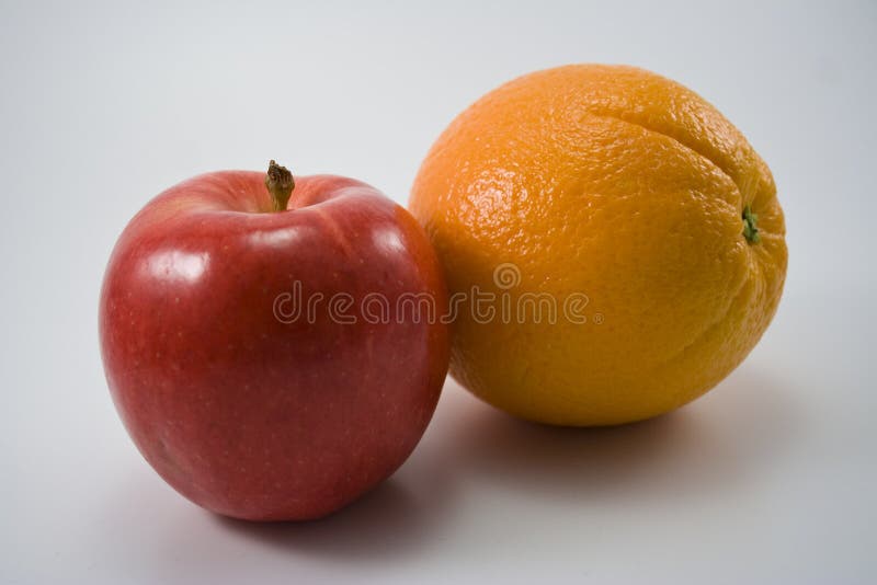 An Apple and an Orange stock image. Image of fruit, apple - 8223871