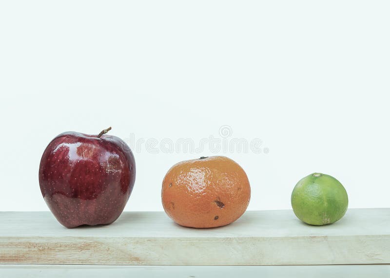 Apple and orange stock image. Image of drink, ripe, wood - 86070745