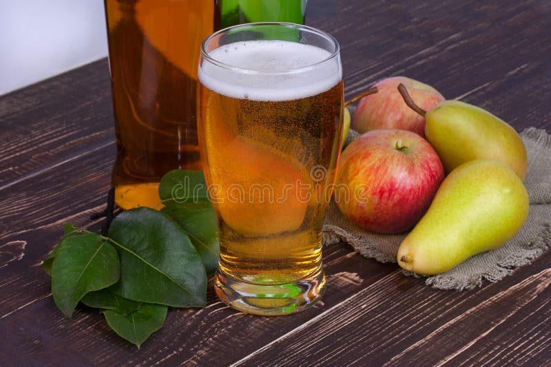 Apple and Pear Cider Glass and Bottles with Fruits. Stock Image - Image ...