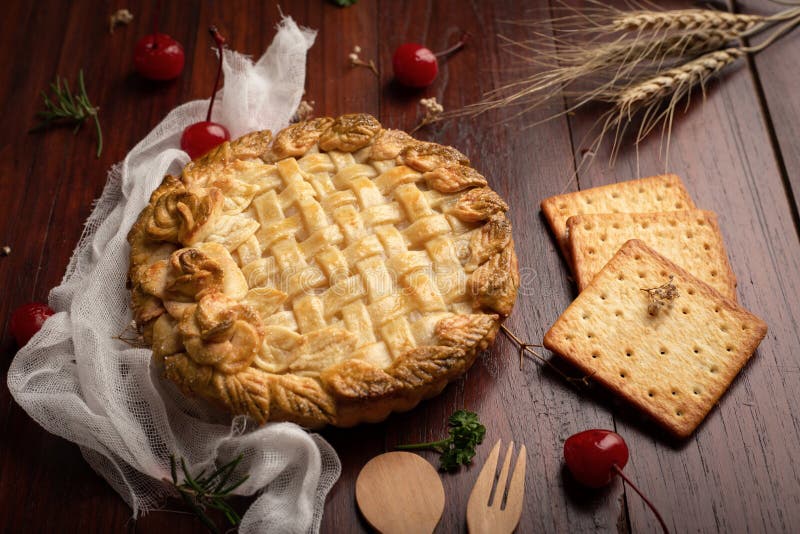 Apple Pie with Red Cherry on Wooden Table Stock Photo - Image of light ...