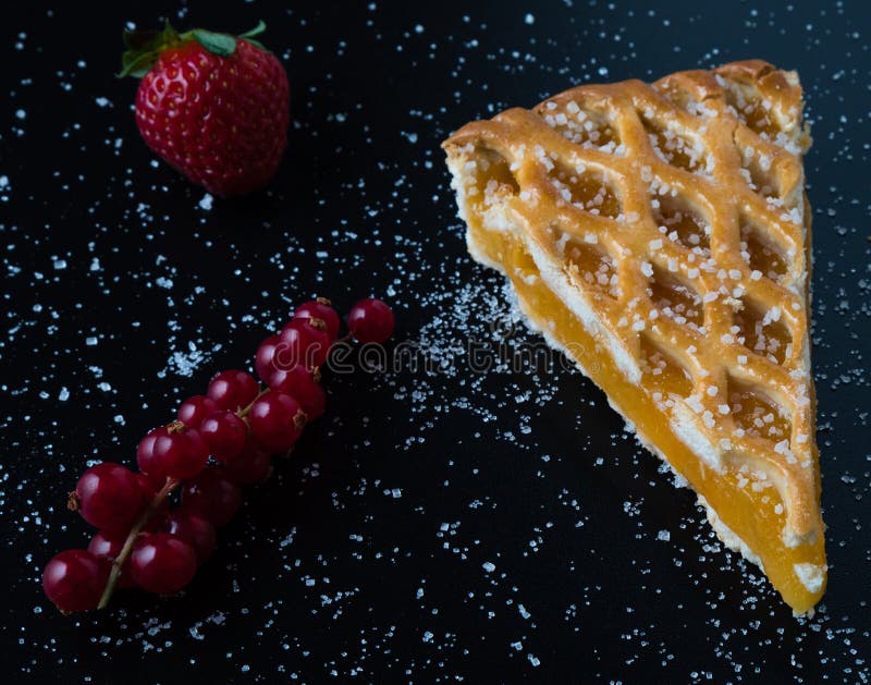 Apple Pie Slice on Black Table with Currant and Strawberry Stock Image ...