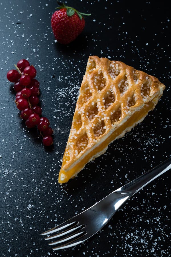 Apple Pie Slice on Black Table with Currant and Strawberry Stock Image ...