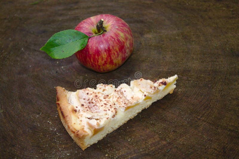 Apple Pie and an Apple on a Tree Trunk Stock Photo - Image of applecake ...