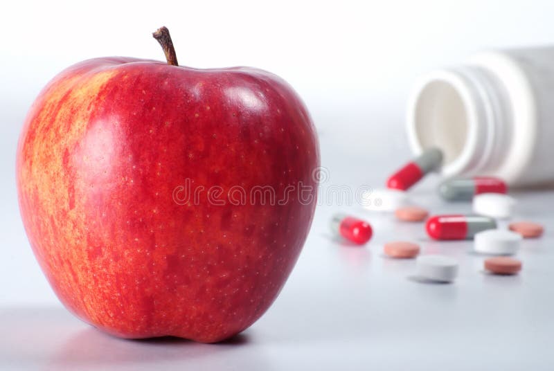 Apple with pills stock photo. Image of fruit, tablets - 22530618