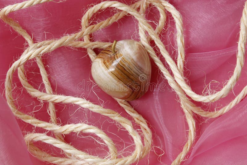 Apple on a Pink Background with a String Stock Photo - Image of pink ...