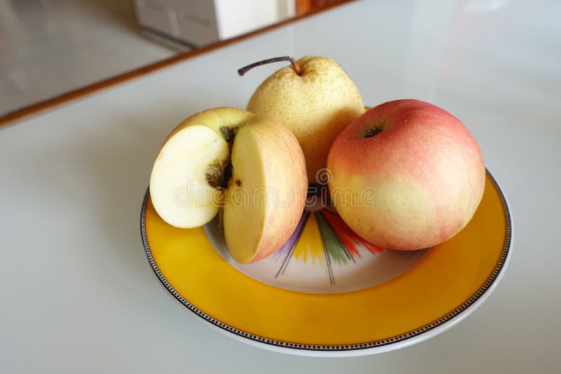 Apple on plate stock photo. Image of kitchen, apple - 111297932
