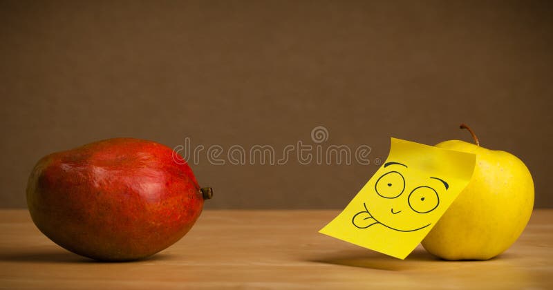 Apple with Post-it Note Sticking Out Tongue To Mango Stock Image ...