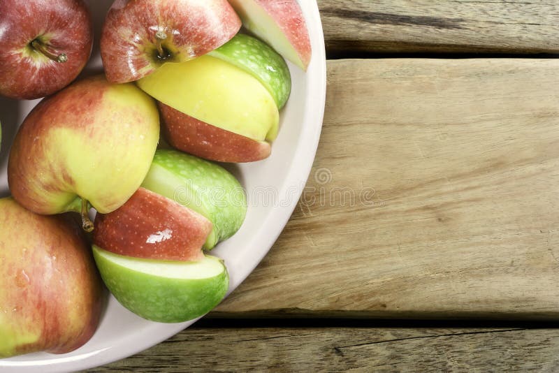 Apple`s Multi-colored on a Pink Plate. Stock Image - Image of nature ...