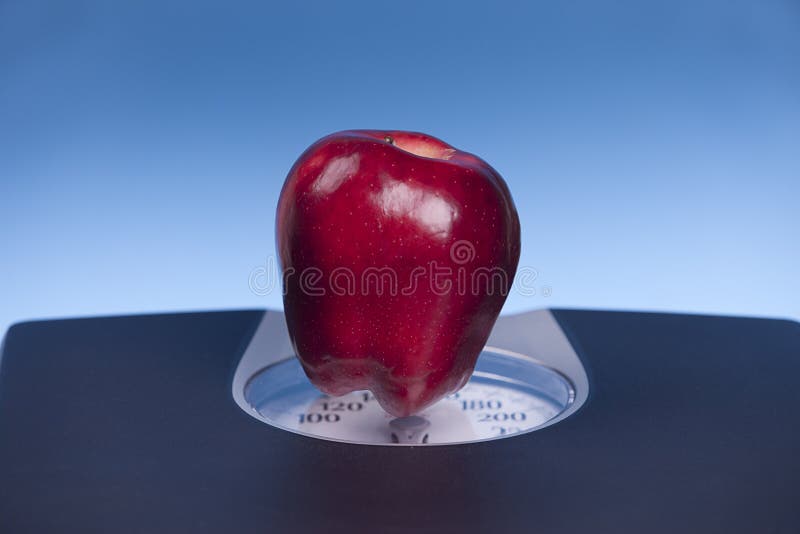 Apple on a scale. stock photo. Image of fresh, fruit - 37985742