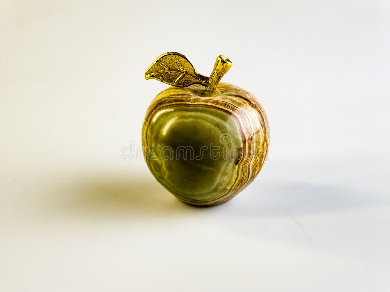 Apple Shape Onyx with Golden Leaf on White Background. Souvenir and ...