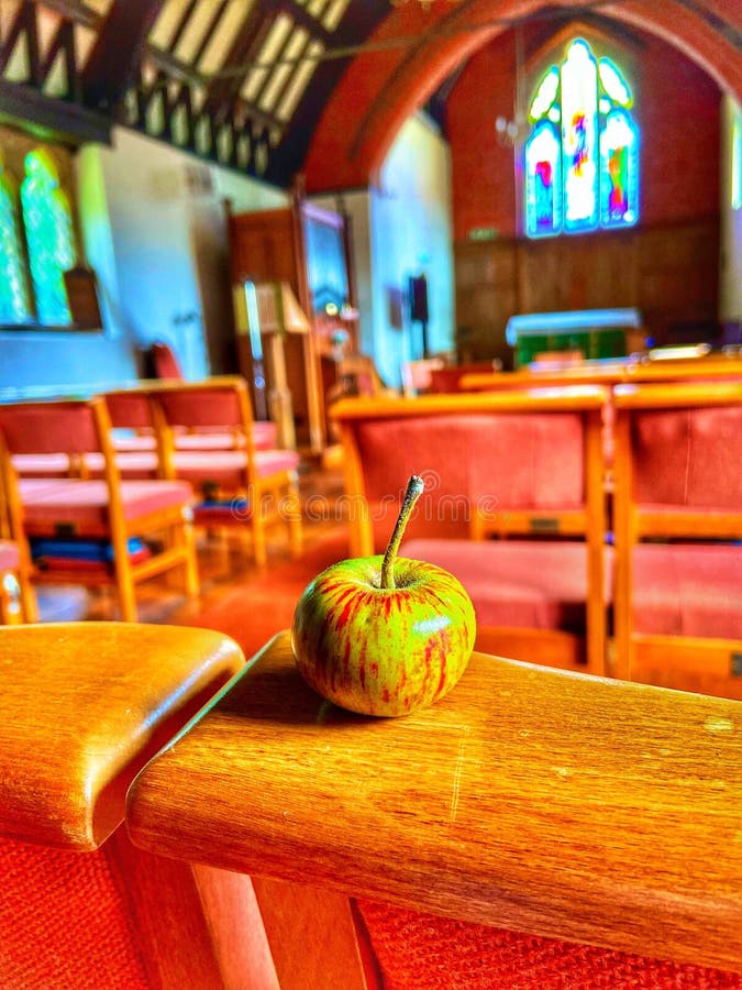 Apple Sitting on Bench in Chapel or Church Setting Stock Image - Image ...