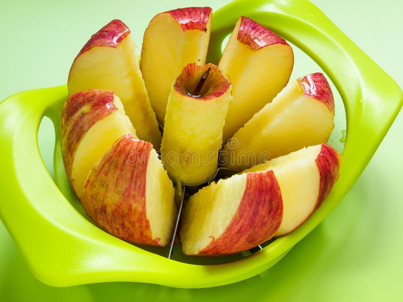 Apple Sliced and Core in an Apple Corer Stock Image - Image of ...