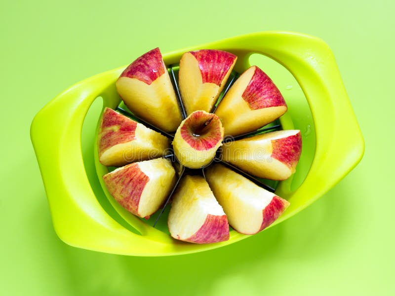 Apple Sliced and Core in an Apple Corer Stock Image - Image of ...