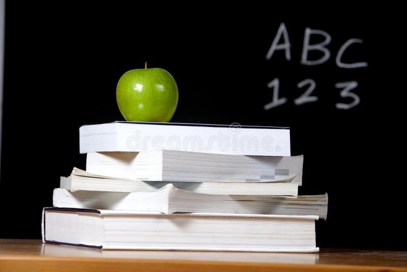 Apple on Stack of Books in Classroom Stock Image - Image of apple ...