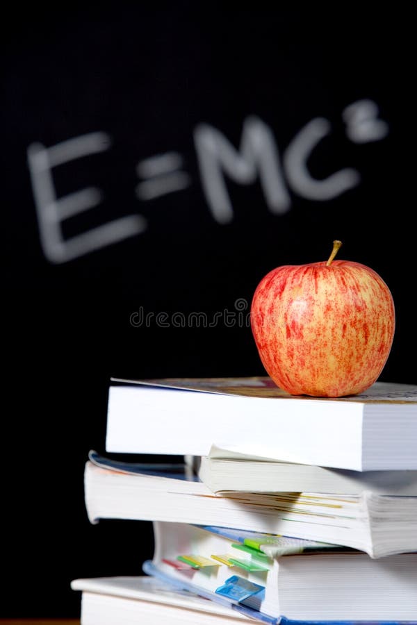 Apple on Stack of Books in Classroom Stock Photo - Image of math ...