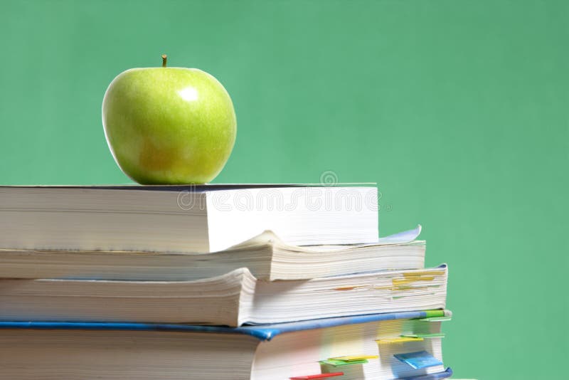 Apple on Stack of Books in Classroom Stock Image - Image of classroom ...