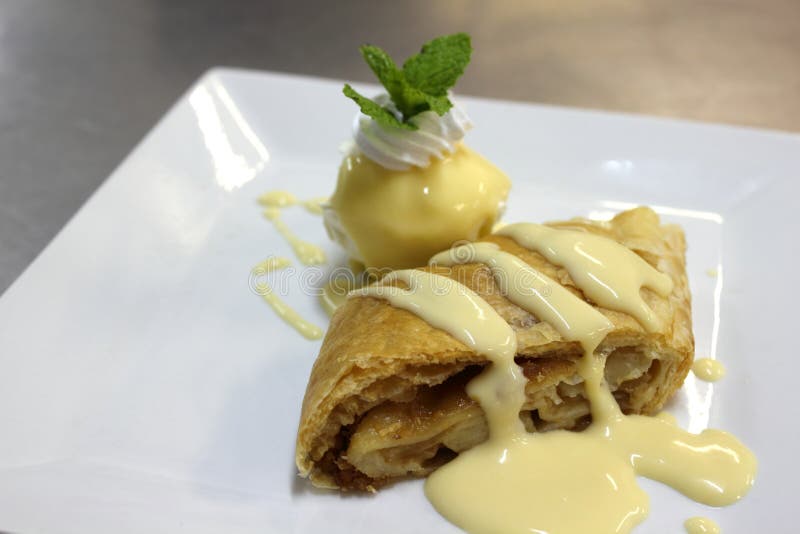 Apple Strudel with Hot Vanilla Sauce Stock Photo - Image of bakery ...