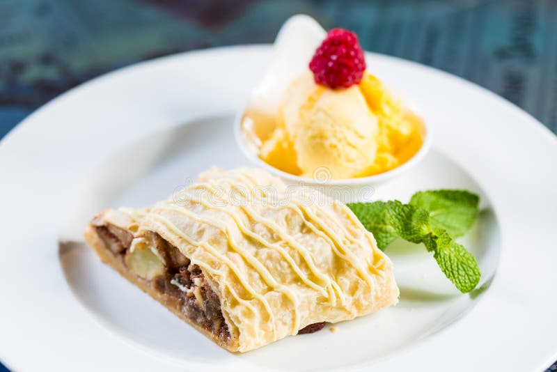 Apple Strudel with Icing Sugar,almonds and Vanilla Stock Image - Image ...