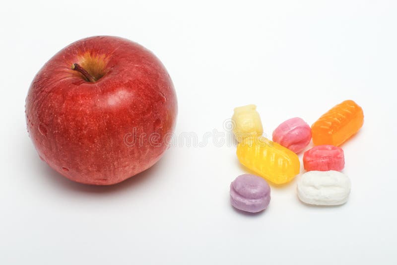 Apple and sweet candies stock image. Image of suck, fruit - 22756959