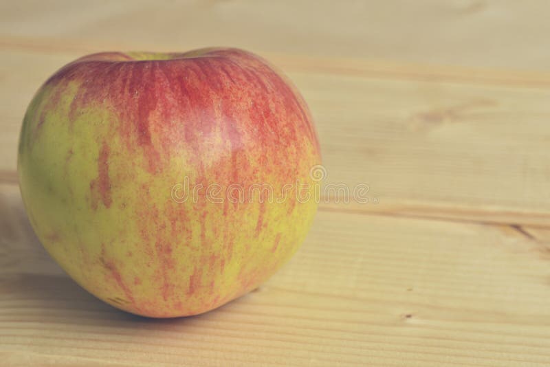 Apple on the table stock photo. Image of color, fruit - 43735472