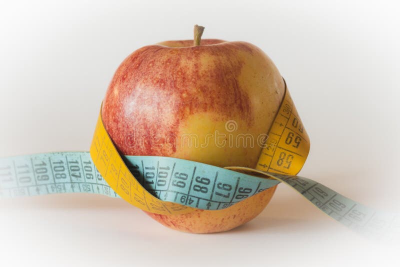Apple tighten with a meter stock image. Image of healthy - 87618989