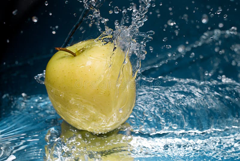 Apple in water stock image. Image of sour, apple, yellow - 18742155