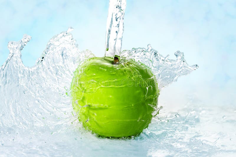 Apple and water stock photo. Image of refreshing, splashing - 73951182