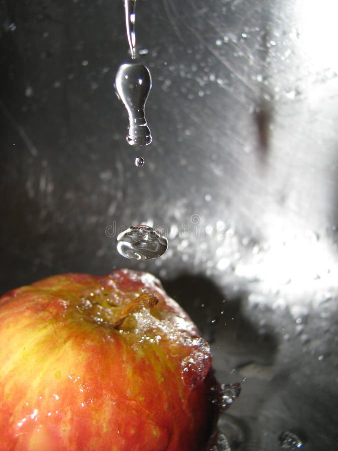 Apple With Water Splash stock photo. Image of liquid, reflect - 4434386