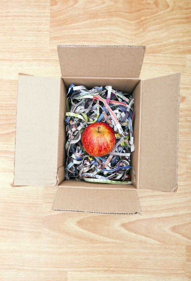 Apple wrapped up in a box stock photo. Image of still - 31843594