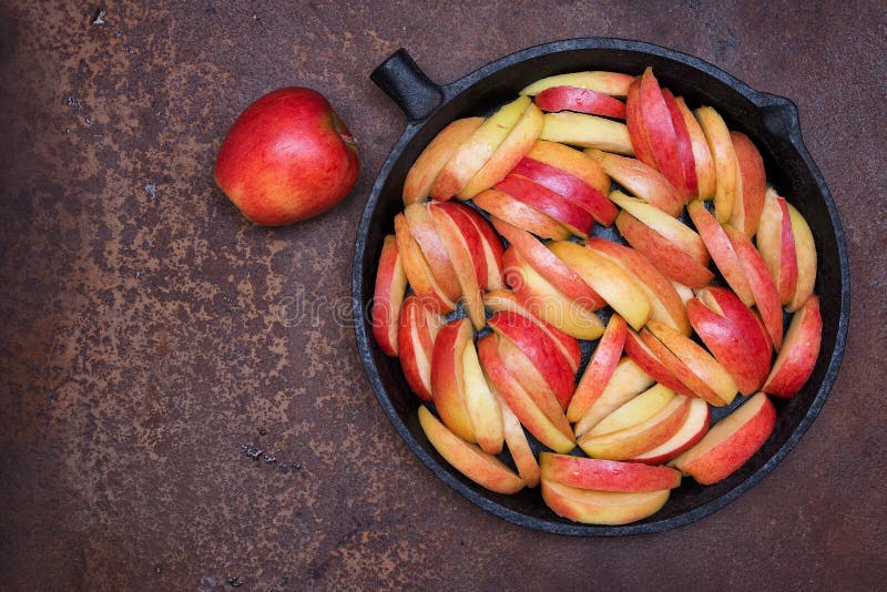 The Apples Cut by Pieces and Whole Red Apple in a Pig-iron Form for ...