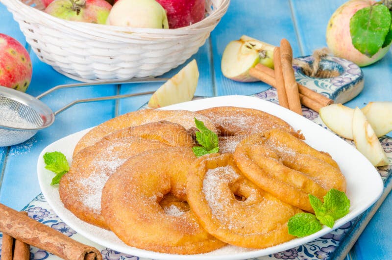 Apples Fried in a Batter with Cinnamon and Powdered Sugar Stock Image ...