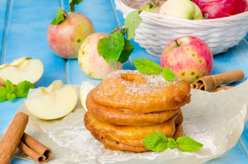 Apples Fried in a Batter with Cinnamon and Powdered Sugar Stock Photo ...