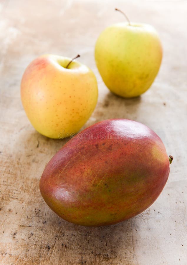 Apples and mango. stock image. Image of shot, mango, life - 61574291