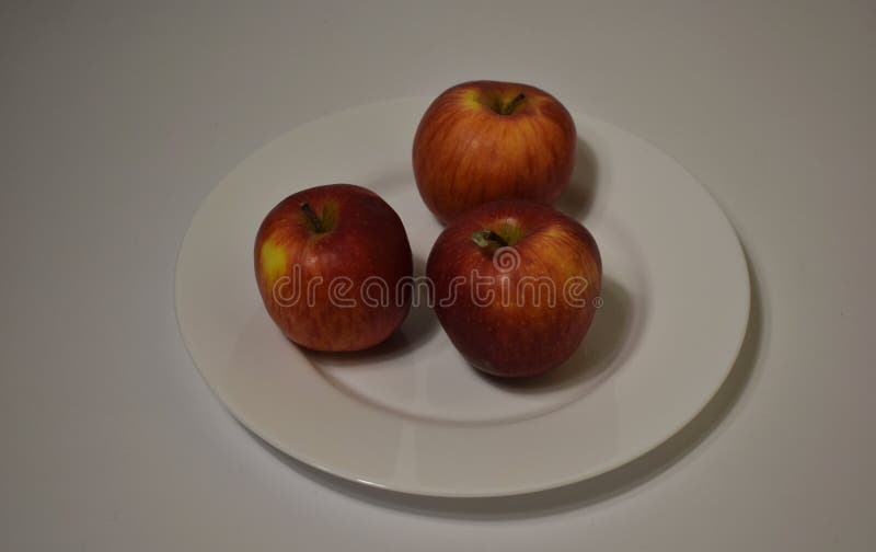 Apples on a plate stock image. Image of snack, vitamin - 174745549