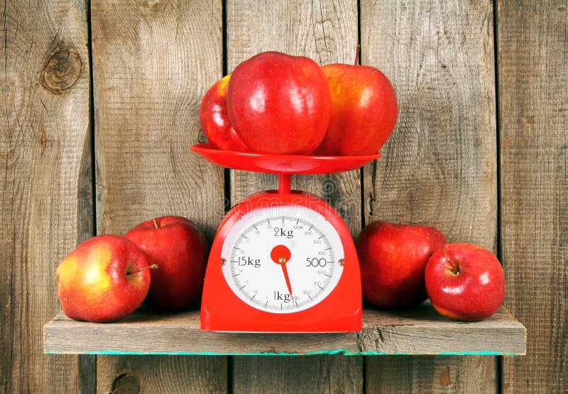 Apples on scales stock photo. Image of brown, apple, group - 44677388