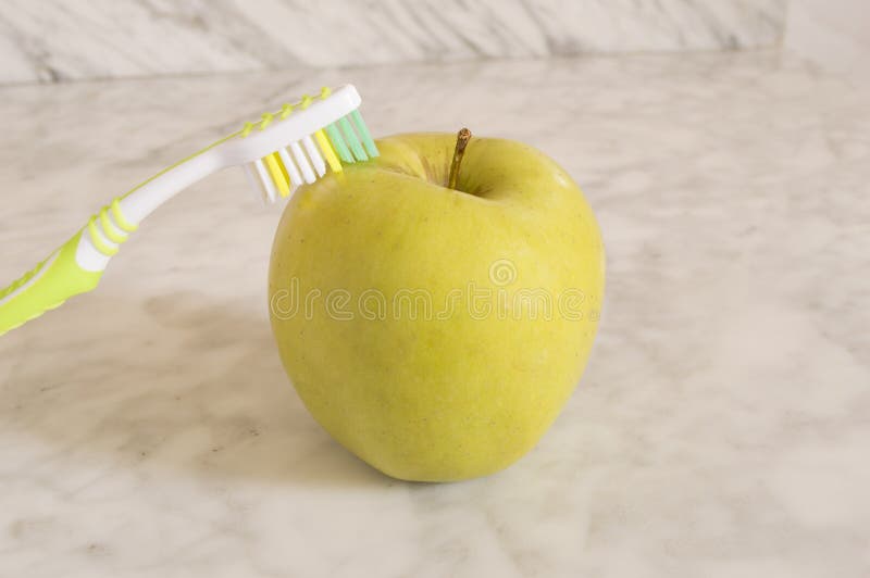 Apples with a toothbrush stock photo. Image of apples - 30760748