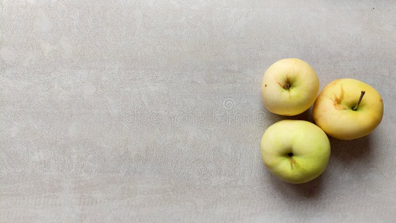 Apples on a White Textured Table Top View, Three Apples on the Table ...