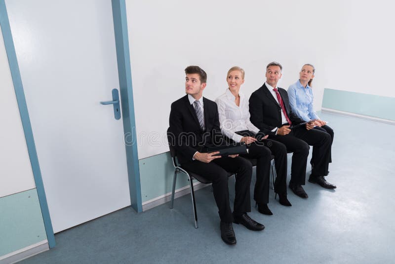 Applicants Sitting on Chair in Office Stock Photo - Image of applicant ...