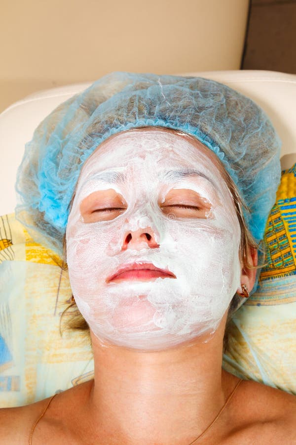 Application of a Cosmetic Mask on the Face Stock Image - Image of hand ...