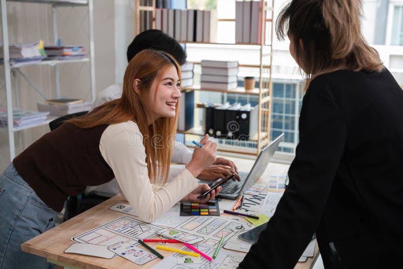 Application Development Team Meet Together To Brainstorm Ideas for ...