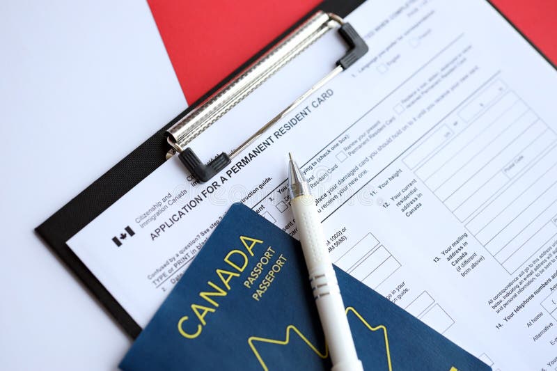 Application for Permanent Resident Card on Table with Pen and Canadian ...