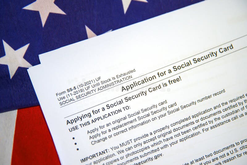 Social Security Card is Placed on the American Flag, Background. Social ...