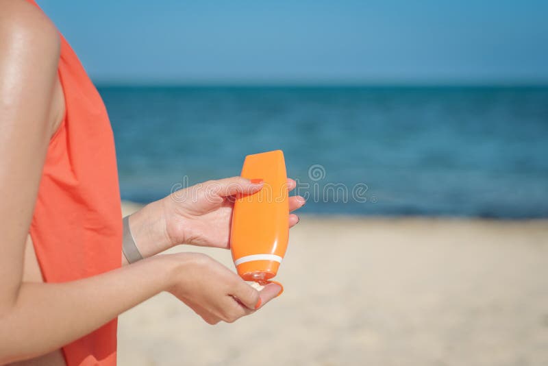 Application of a Sunscreen Cream Stock Image - Image of beach, travel ...